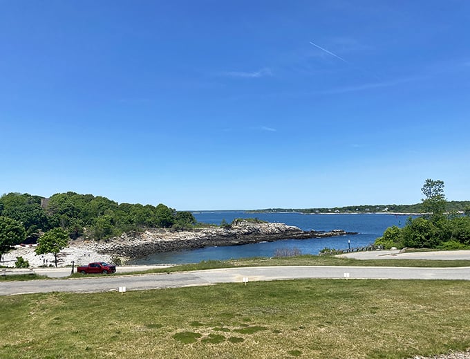 A winding path invites exploration along the rocky shoreline, promising new perspectives of Maine's most photographed coastal landmark.