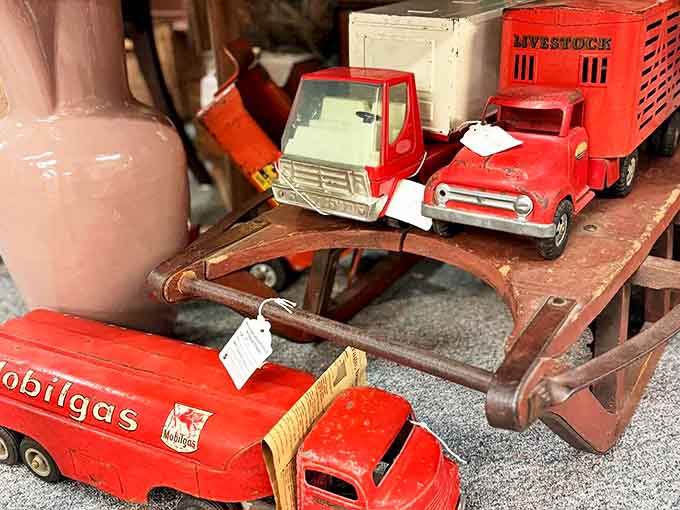 Vintage toy trucks that have hauled imaginary cargo across countless childhood floors, now waiting for their next generation of admirers.