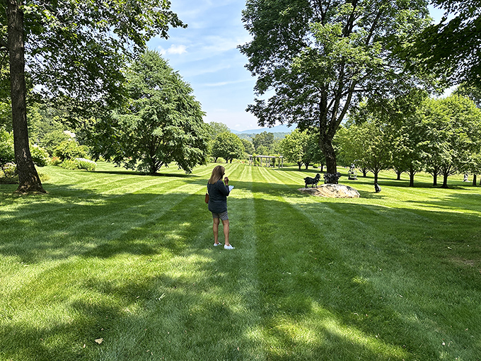 One visitor pauses to take it all in, probably wondering if their own backyard could ever look this good.