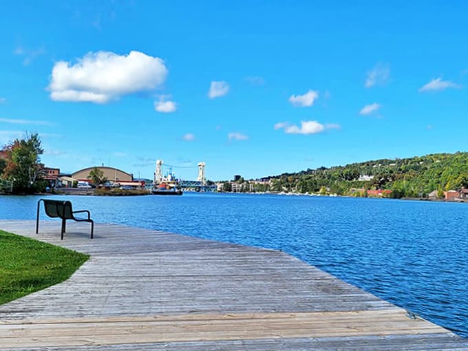 Houghton's waterfront park invites contemplation with its simple bench overlooking waters that once carried copper to build a nation.