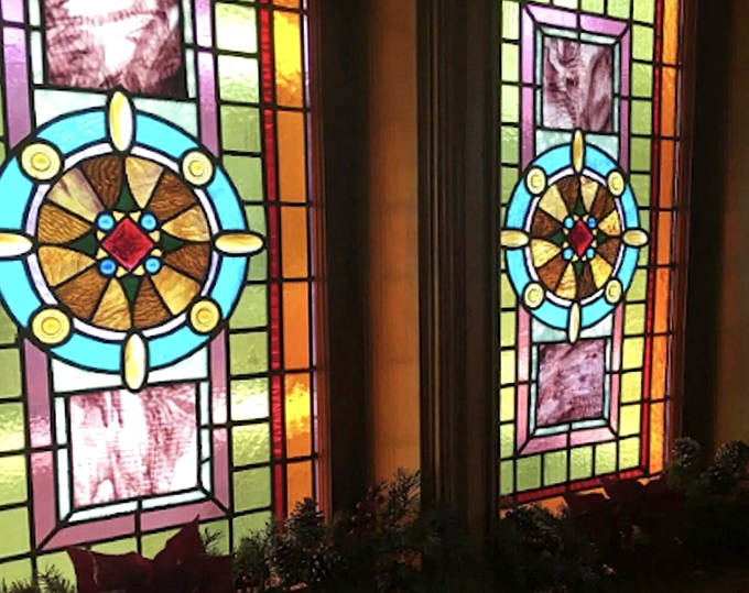Stained glass transforms ordinary sunlight into an ever-changing kaleidoscope – nature's own light show, no electricity required.