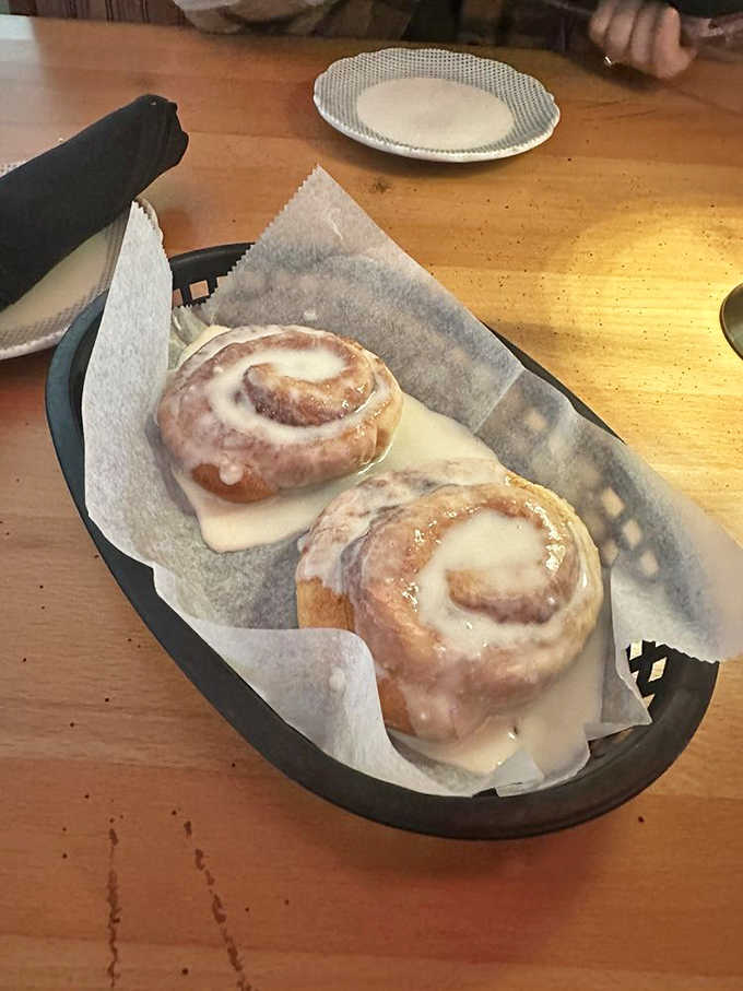 Warm, gooey cinnamon rolls with frosting that melts into every crevice &ndash; proof that sometimes the simplest pleasures are the most profound.