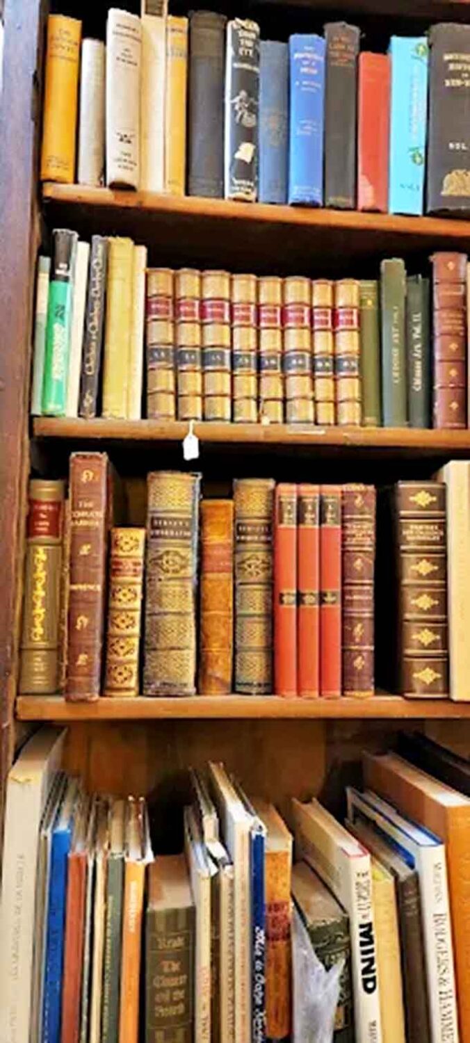 Leather-bound wisdom stands at attention &ndash; these aren't just books but time capsules, their spines telling stories before you even read a single page.