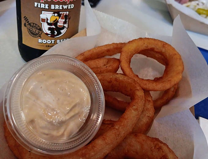 Golden-fried onion rings with a side of creamy dipping sauce &ndash; simple pleasures that somehow taste better in a historic diner than anywhere else.
