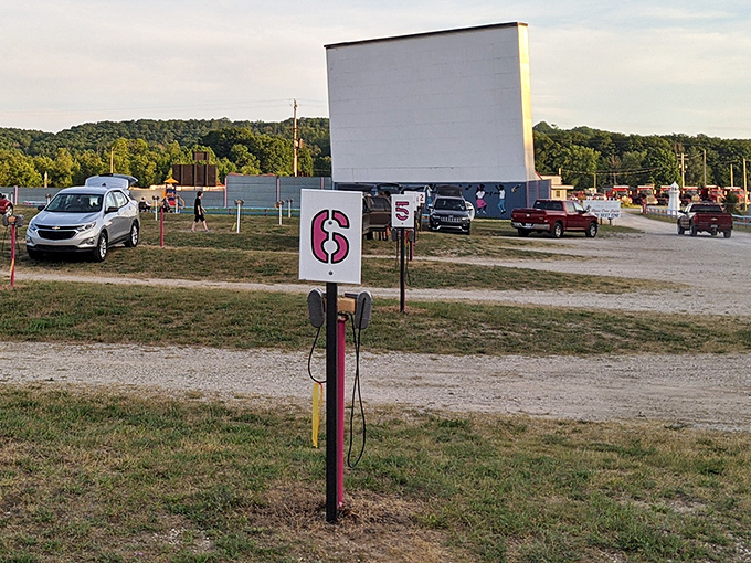 Numbered parking spots guide viewers at Cherry Bowl Drive-In Theatre, where organization meets nostalgia for a smooth outdoor movie experience.