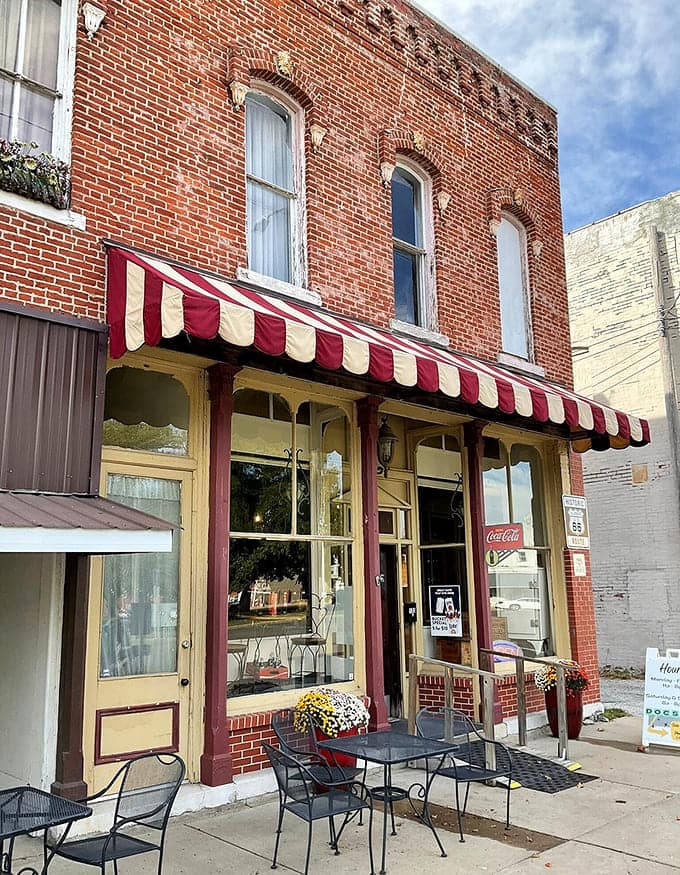 Doc's Soda Fountain's brick exterior and striped awning promise old-fashioned treats and nostalgia.