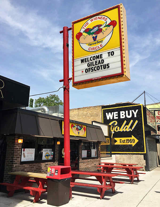 The Wiener's Circle's bright yellow sign has become legendary in Chicago, marking the spot for late-night hot dogs served with a side of sass.