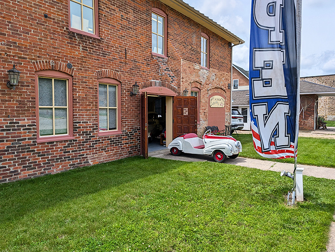 This vintage pedal car welcomes visitors to a world of miniature motoring at Wisconsin's tribute to tiny transportation.