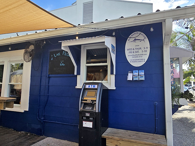 Even the ATM outside maintains the restaurant's coastal charm, standing ready for those who'll inevitably want to order "just one more" of everything.