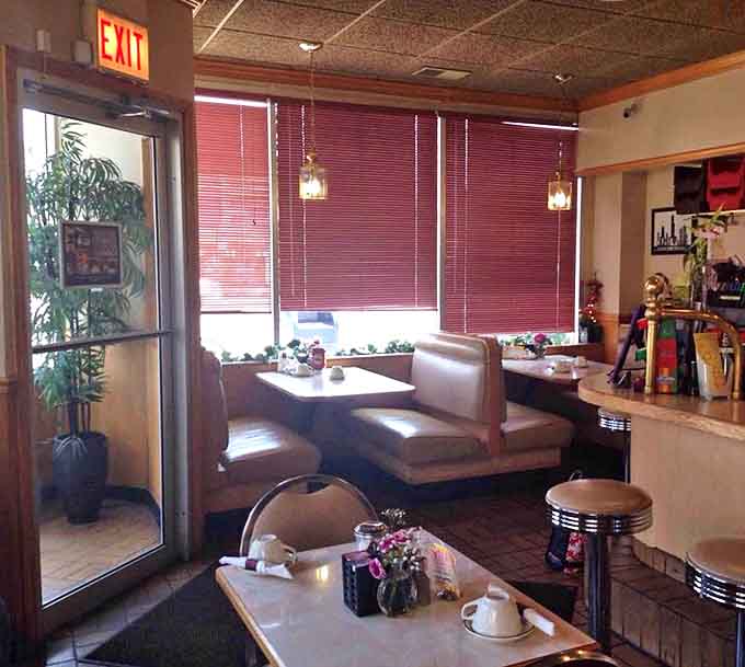 Another angle of Alexander's timeless interior reveals the careful dance of servers who've been perfecting their craft for decades in this beloved Chicago institution.