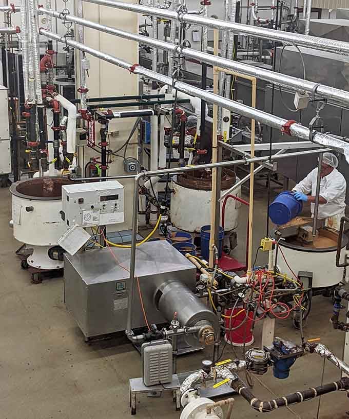 Holiday preparations in full swing as dedicated candy crafters arrange Easter treasures &ndash; their skilled hands transforming simple ingredients into seasonal joy.