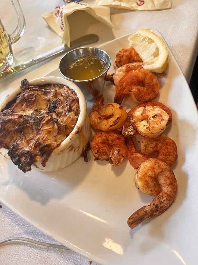 Broiled shrimp paired with rich, bubbling au gratin potatoes creates the kind of surf-and-turf dreams are made of.