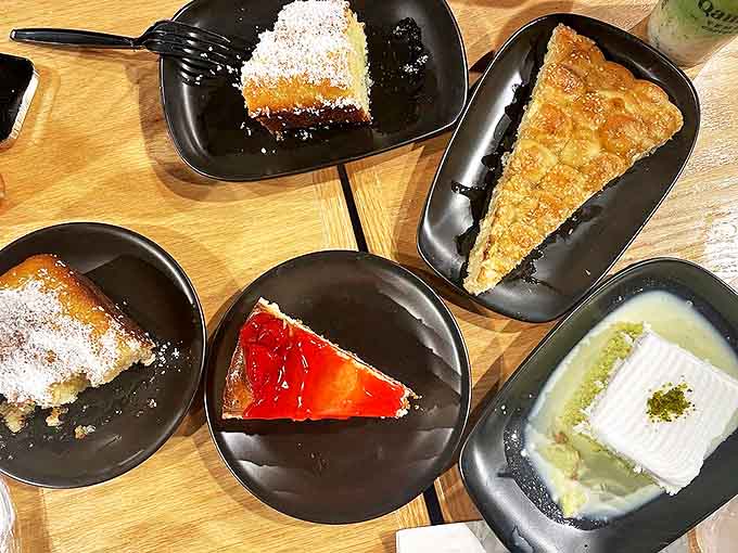 A dessert lover's dream tableau – five distinct cheesecake varieties showcase the kitchen's range from traditional classics to innovative cultural fusions.