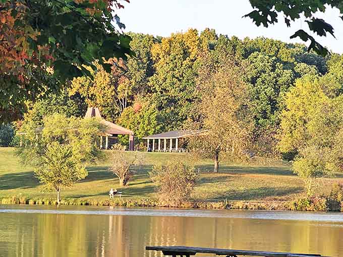 Golden hour transforms lakeside structures into glowing sanctuaries, perfect for gathering with loved ones as day transitions to evening.