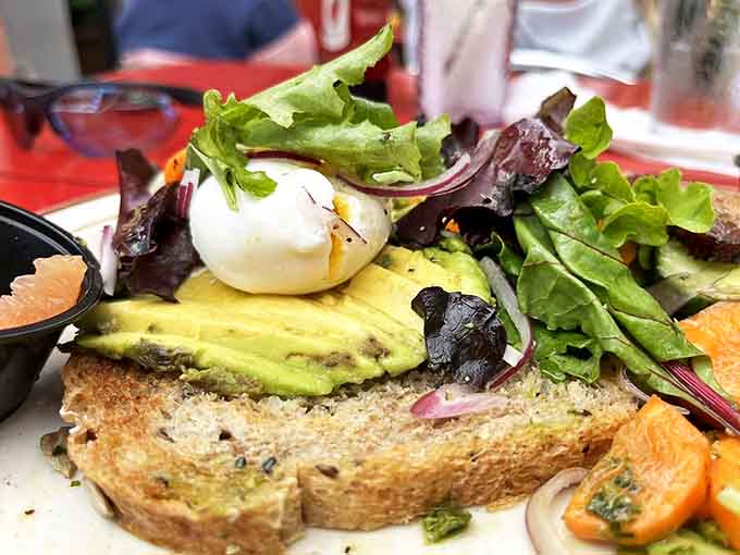Avocado toast gets the Watson's treatment with perfectly poached eggs, fresh greens, and vibrant citrus&mdash;breakfast elevated to an art form.