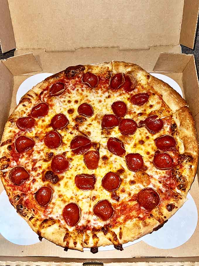 Those perfectly curled pepperoni cups holding tiny pools of flavor-packed oil &ndash; nature's way of saying "This pizza understands you."