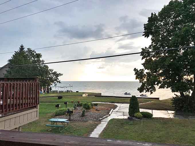 From this lakeside perch, worries dissolve faster than ice cream on a hot summer day – Michigan therapy at its finest.