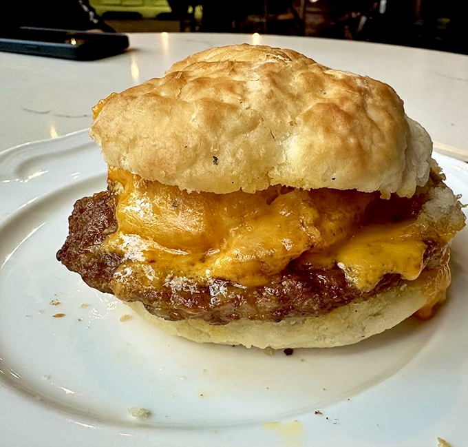 A breakfast sandwich that deserves its own fan club &ndash; nestled beside an iced coffee that promises to make Arizona heat feel worthwhile.