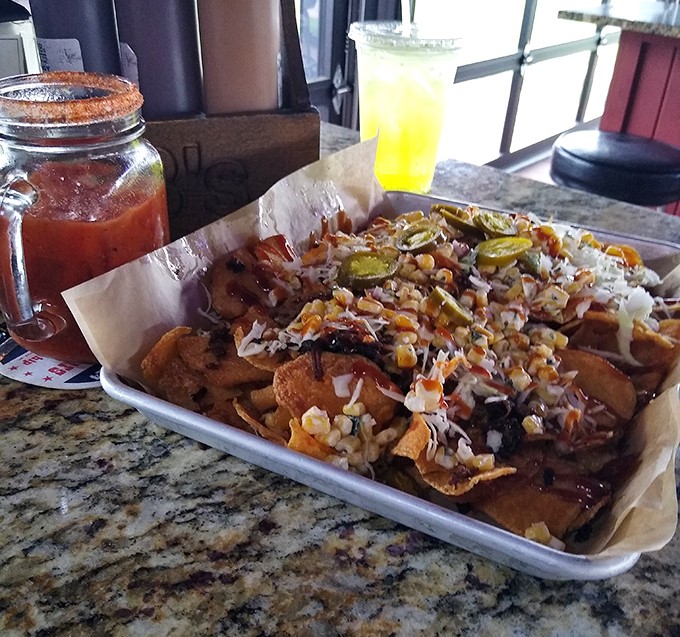 Loaded fries that laugh at the concept of "too much" &ndash; a glorious mess of toppings that requires both fork and commitment.