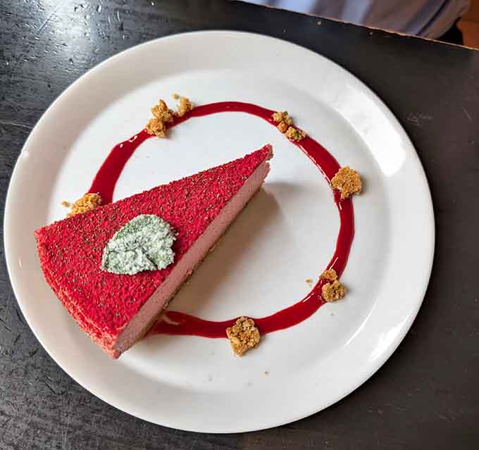 This pomegranate cheesecake is so vibrantly pink, it looks like it belongs in a Wes Anderson film.
