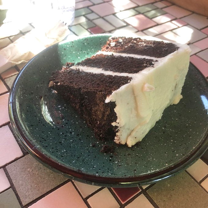 The homemade chocolate cake with creamy frosting proves Satchel's magic extends beyond pizza to sweet territory worth saving room for.