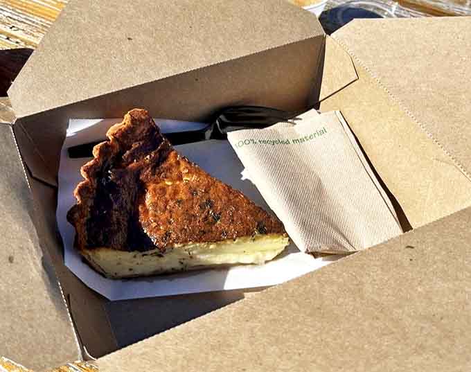 This quiche isn't just food&mdash;it's a savory French poem in a cardboard box, waiting to make your picnic by the lake absolutely magnificent.