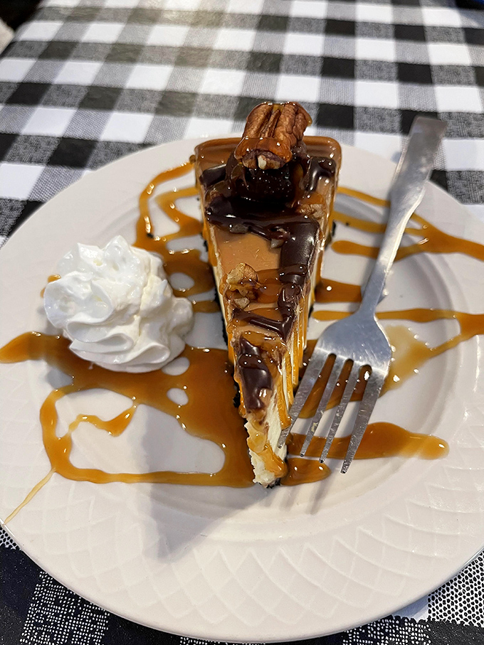 The legendary cheesecake arrives drizzled with caramel and chocolate &ndash; a dessert worth saving room for, or ordering to-go when you inevitably can't.