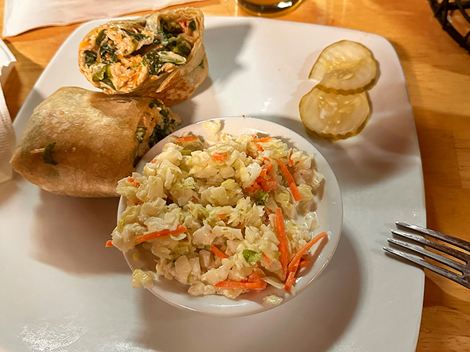 Fresh and flavorful chicken wrap with crisp coleslaw &ndash; proof that "lighter fare" doesn't mean sacrificing taste at this roadside gem.