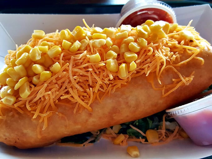 A golden-fried burrito topped with cheese and corn that's so beautiful it should have its own Instagram account and book deal.