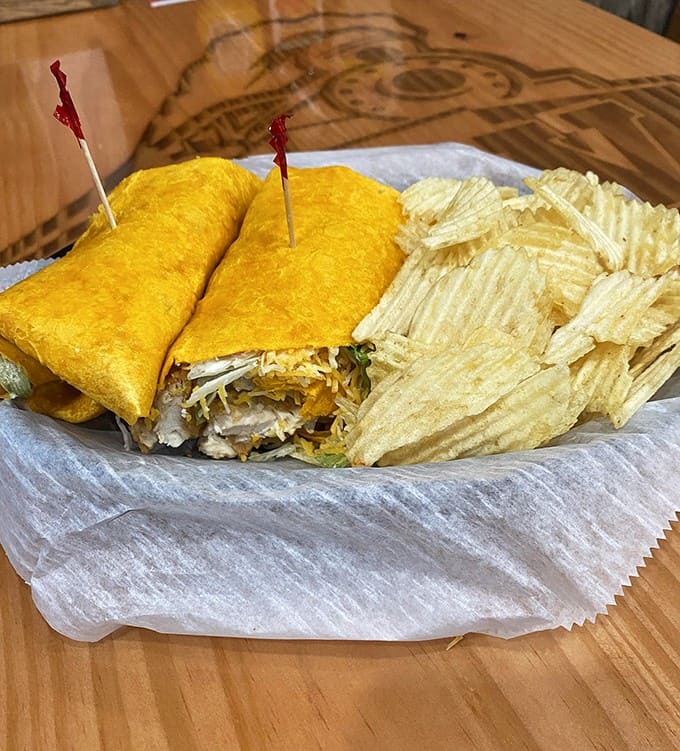 Golden-fried wraps served with crispy potato chips &ndash; the perfect handheld meal when you can't decide between a sandwich and something more adventurous.