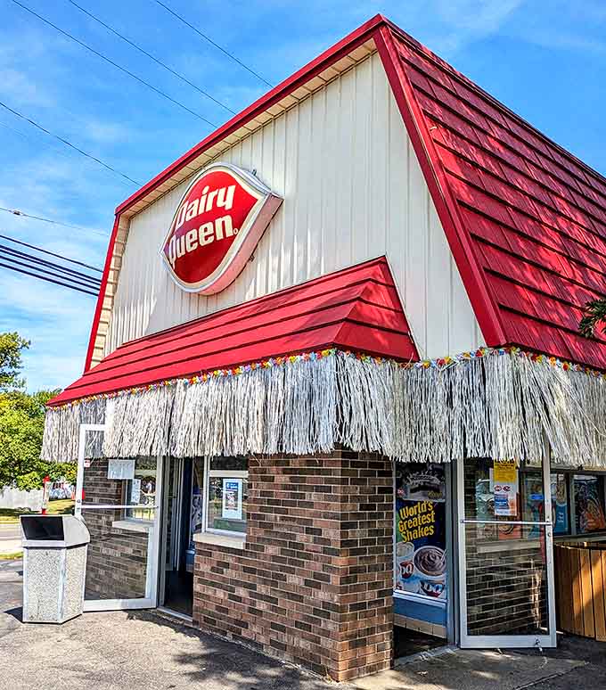 The classic Dairy Queen stands ready to fulfill summer dreams with swirls of soft-serve that taste like childhood memories.