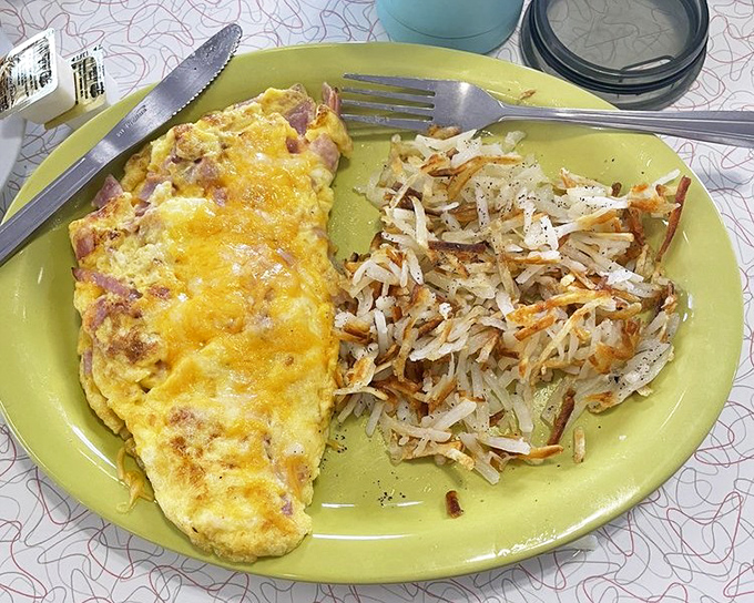 This Denver omelet doesn't just break fast &ndash; it demolishes hunger with fluffy eggs, savory ham, and perfectly crisped hash browns.