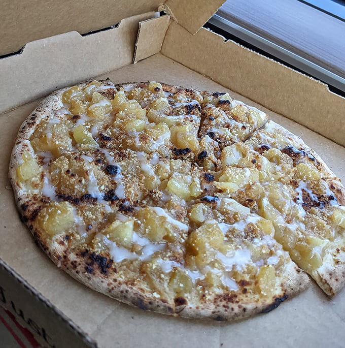 Who says pizza can't be dessert? This sweet creation topped with cinnamon, sugar and fresh fruit provides the perfect finale.