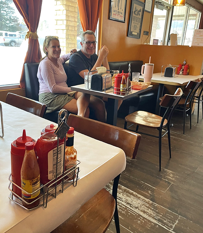 Happy patrons enjoying the fruits of Satchmo's labor &ndash; where every table becomes a stage for the performance of good eating.
