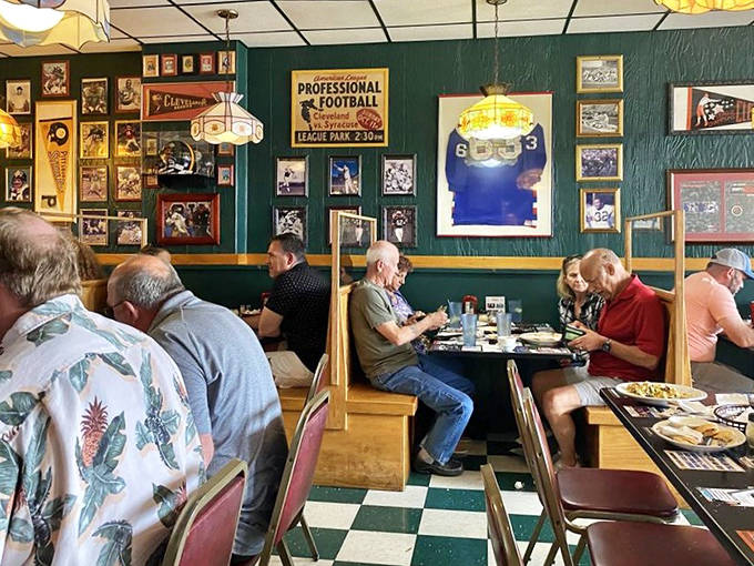 The dining room buzzes with energy as patrons enjoy the unique atmosphere where casual Western charm meets serious steak business.