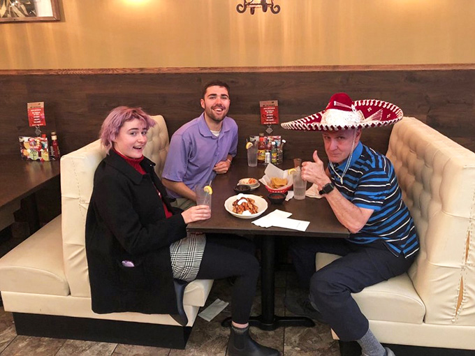 Happy diners proving that good food and good company create the best kind of memories together.