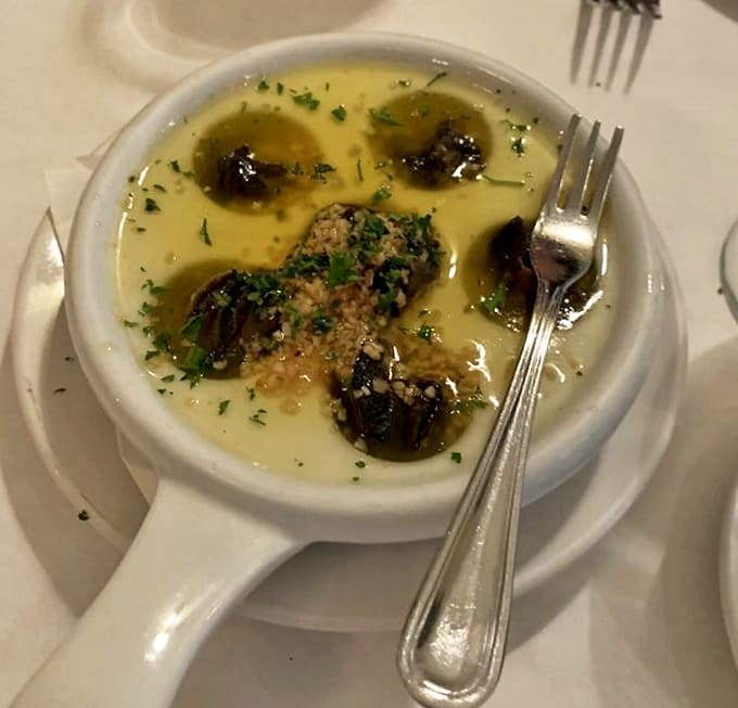 These aren't garden variety snails &ndash; they're tender morsels swimming in garlic butter that you'll want to soak up with every last crumb.