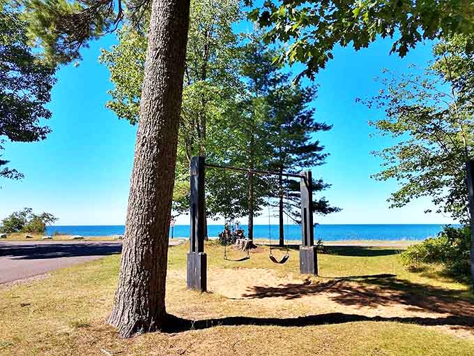 F.J. McLain State Park: Where towering pines frame Lake Superior's endless blue, creating nature's perfect window to tranquility.