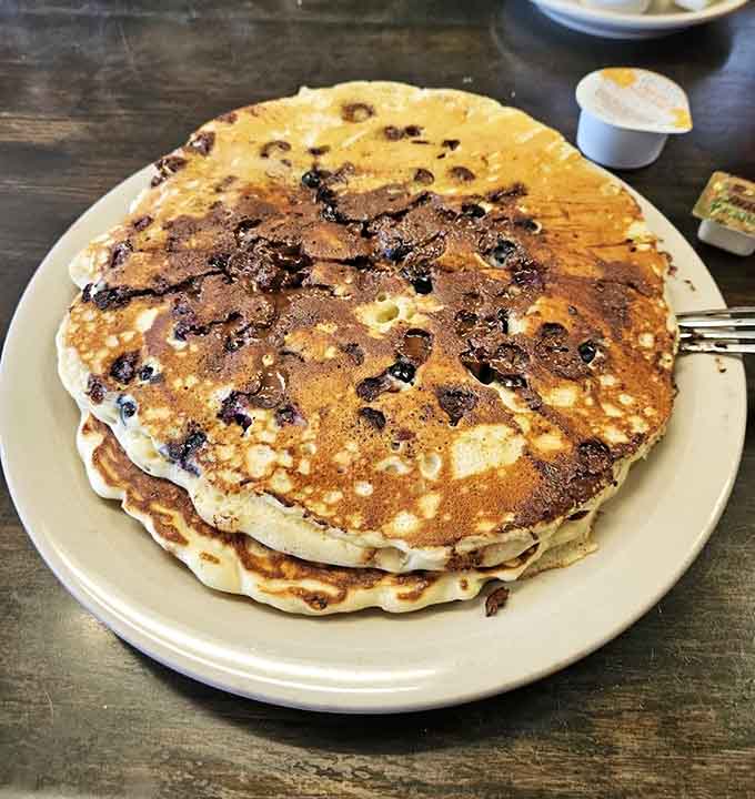 Pancakes so fluffy they might float away if you don't anchor them down with enough syrup immediately.