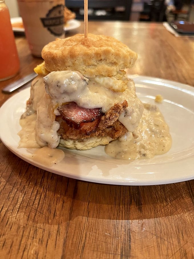 The legendary Five & Dime sandwich, where fried chicken, bacon, and gravy create a holy trinity of flavor that's worth every napkin you'll need.
