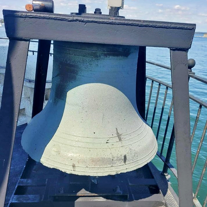 The lighthouse's original fog bell hangs silent now, but once warned mariners through pea-soup fog with its resonant, life-saving tones.