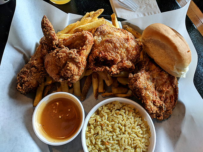 A complete fried chicken dinner that hits all the comfort food notes. That golden-brown crust shatters with each bite, revealing juicy meat beneath.