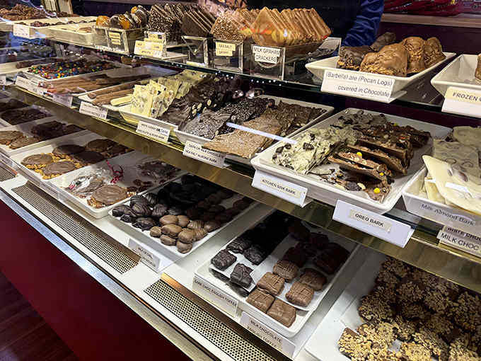 This display case holds more chocolate than some countries produce, and every piece deserves your undivided attention and appetite.