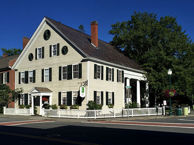 Gallery on the Green: Classic New England architecture with a white picket fence that practically begs you to slow down and appreciate life's simpler pleasures.