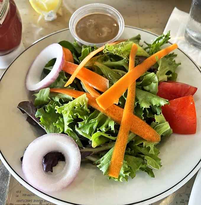 Even the house salad gets star treatment &ndash; crisp greens and vibrant vegetables offering a refreshing counterpoint to rich seafood offerings.
