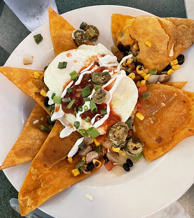 Huevos Rancheros that bring the fiesta to your breakfast table &ndash; those tortilla chips are having the time of their lives.