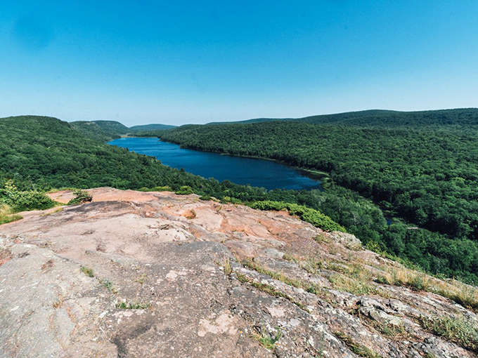 Iron River Ranger District: Lake Overlooker offers a panoramic vista that makes you feel simultaneously tiny and incredibly fortunate to witness such natural grandeur.