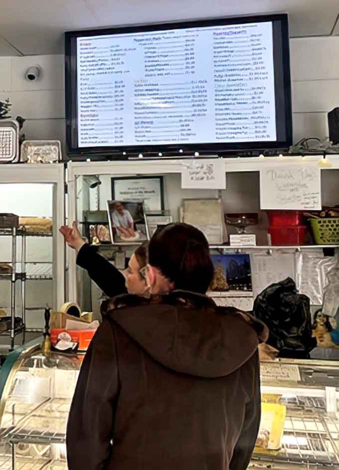 The counter where dreams come true. No fancy digital displays needed&mdash;just good people serving exceptional baked goods with efficiency.