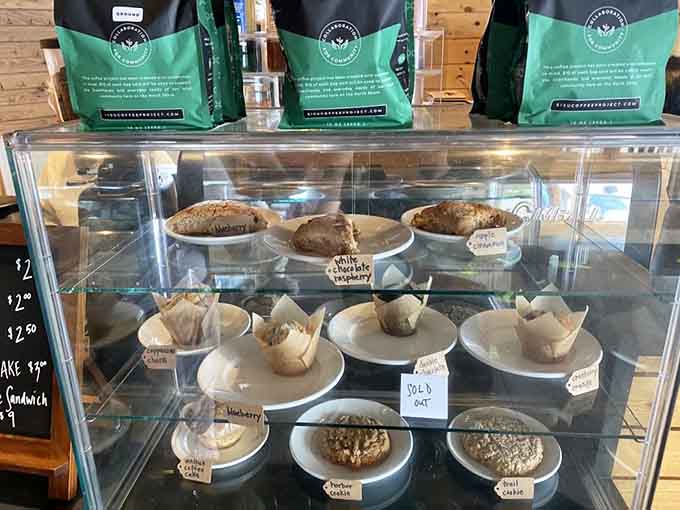 The display case showcases an array of baked temptations that make decision-making nearly impossible for mere mortals.