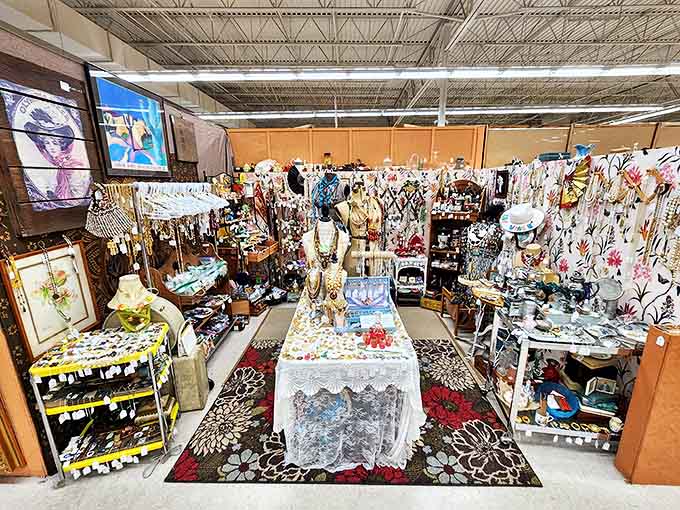 A meticulously arranged booth displays vintage textiles and collectibles. The dealer who created this space clearly understands that presentation is everything.